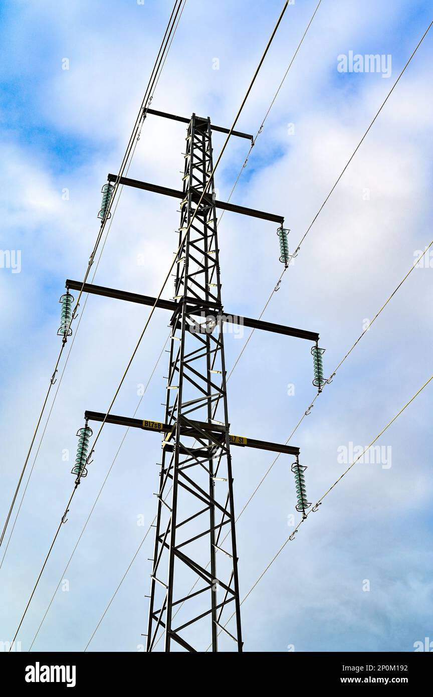 powerline in silhouette on cloudy light sky Stock Photo - Alamy