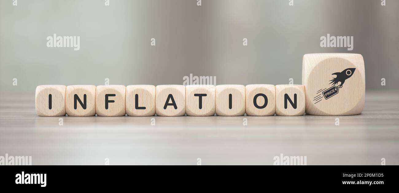 Wooden blocks with symbol of inflation concept Stock Photo - Alamy
