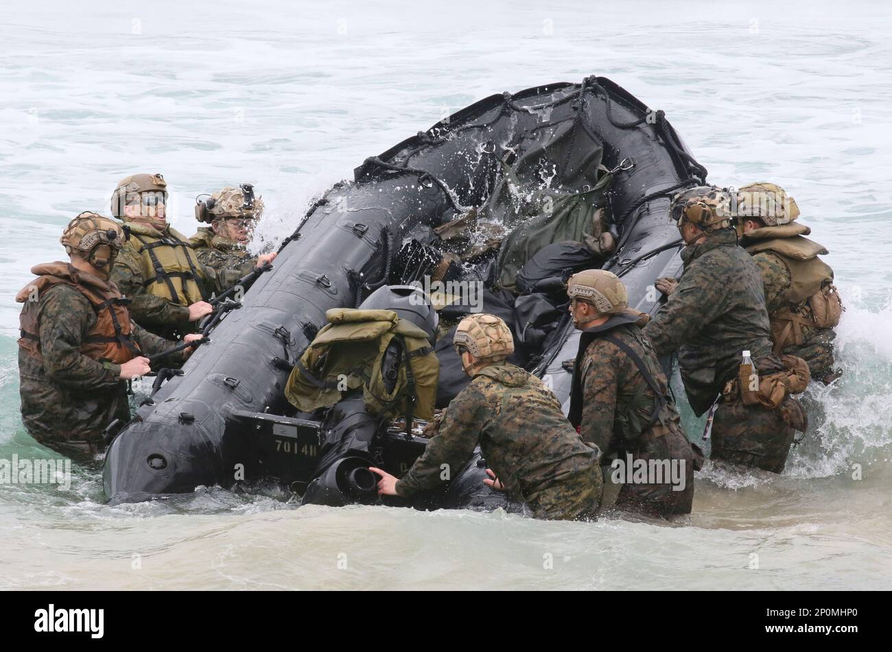 Members of the United States Marine Corps land during a Japan-U.S ...