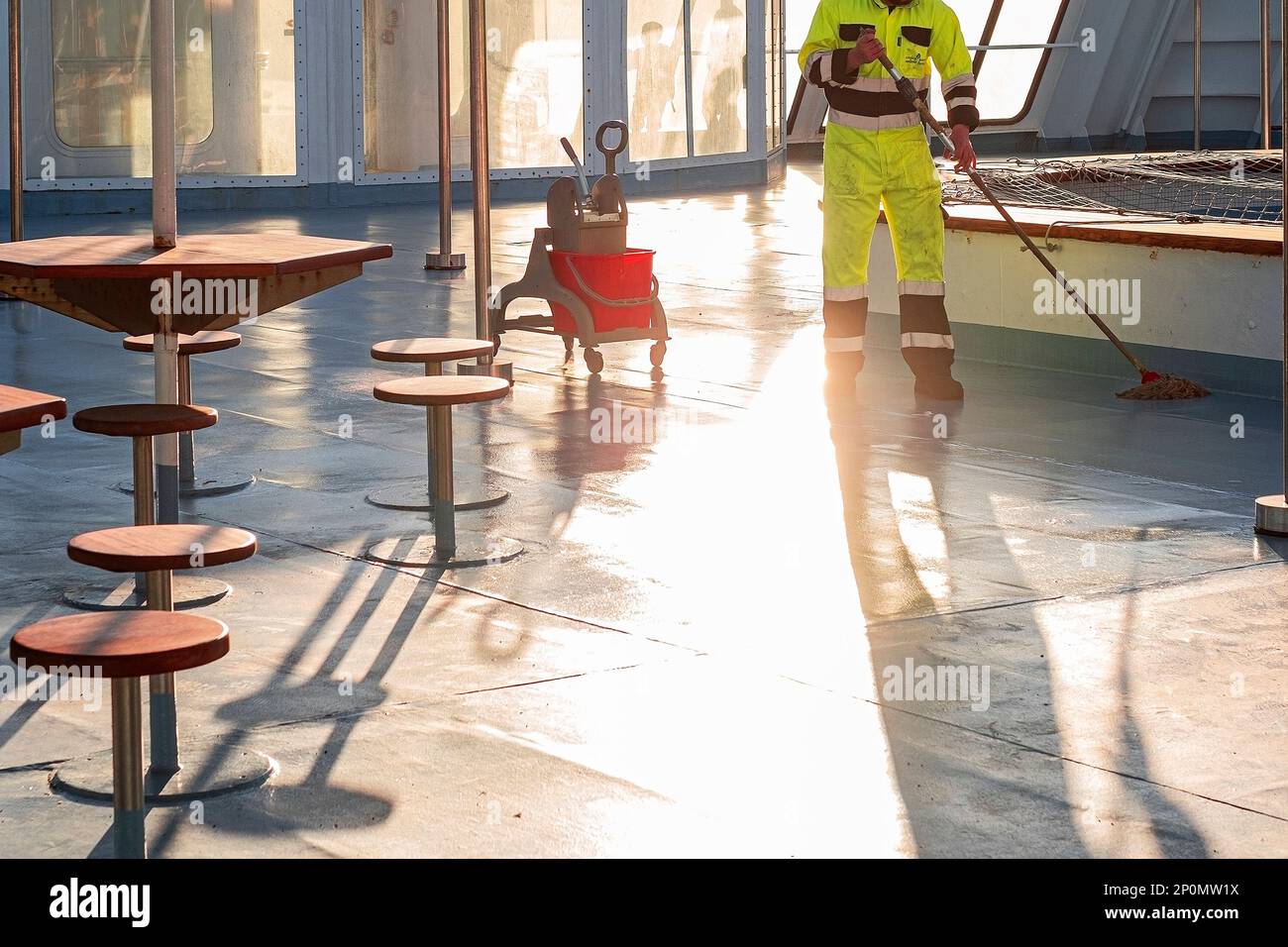 Cleaning and mopping floors on a cruise ship Stock Photo - Alamy