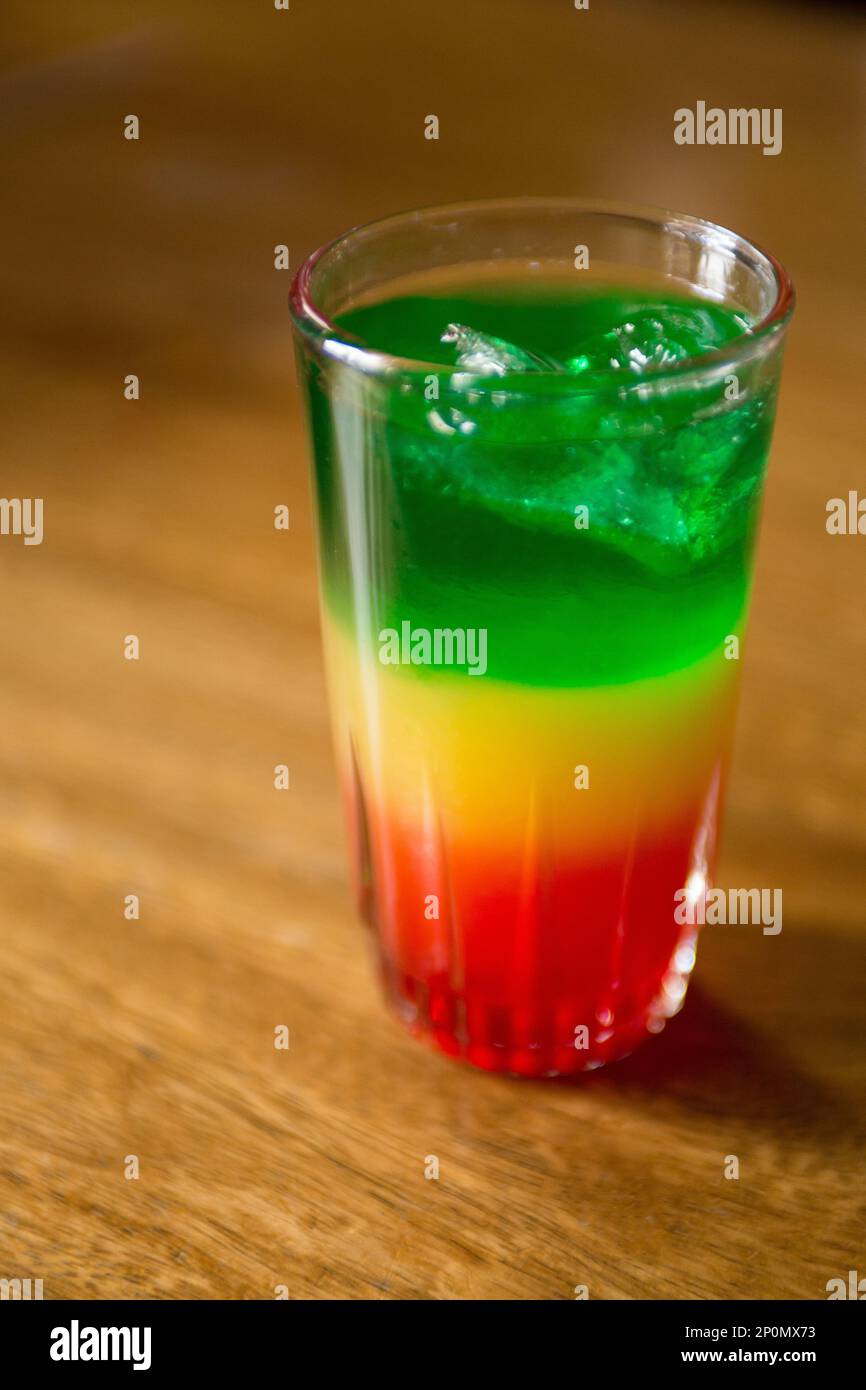 Peruvian Three Layered drink served in a glass Stock Photo - Alamy
