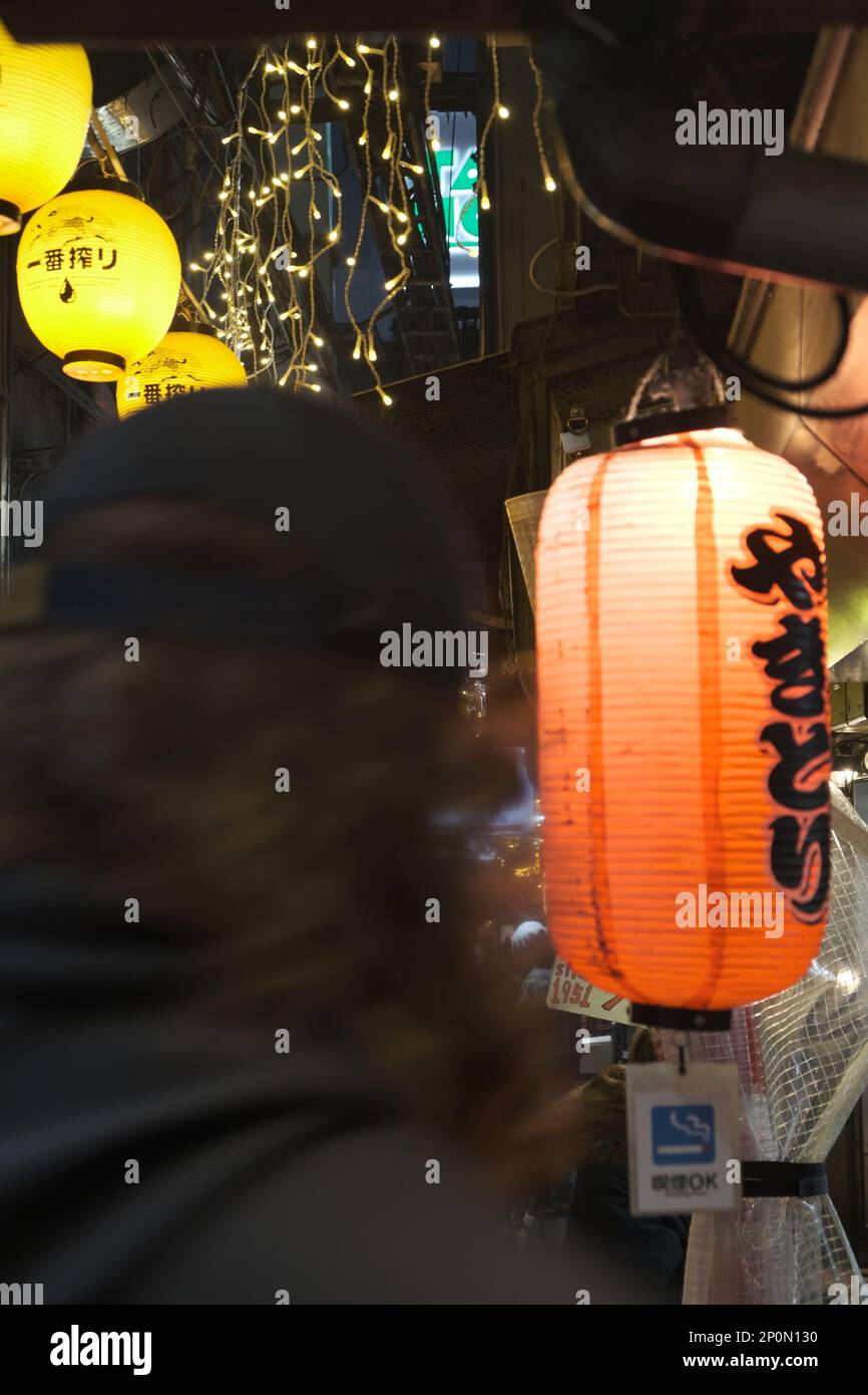 Small alleyway in Japan full of restaurants and people Stock Photo - Alamy