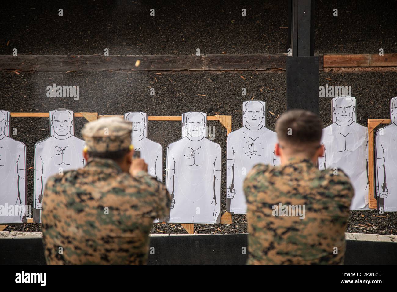 U.S. Marines practice pistol drills during the Marine Corps ...