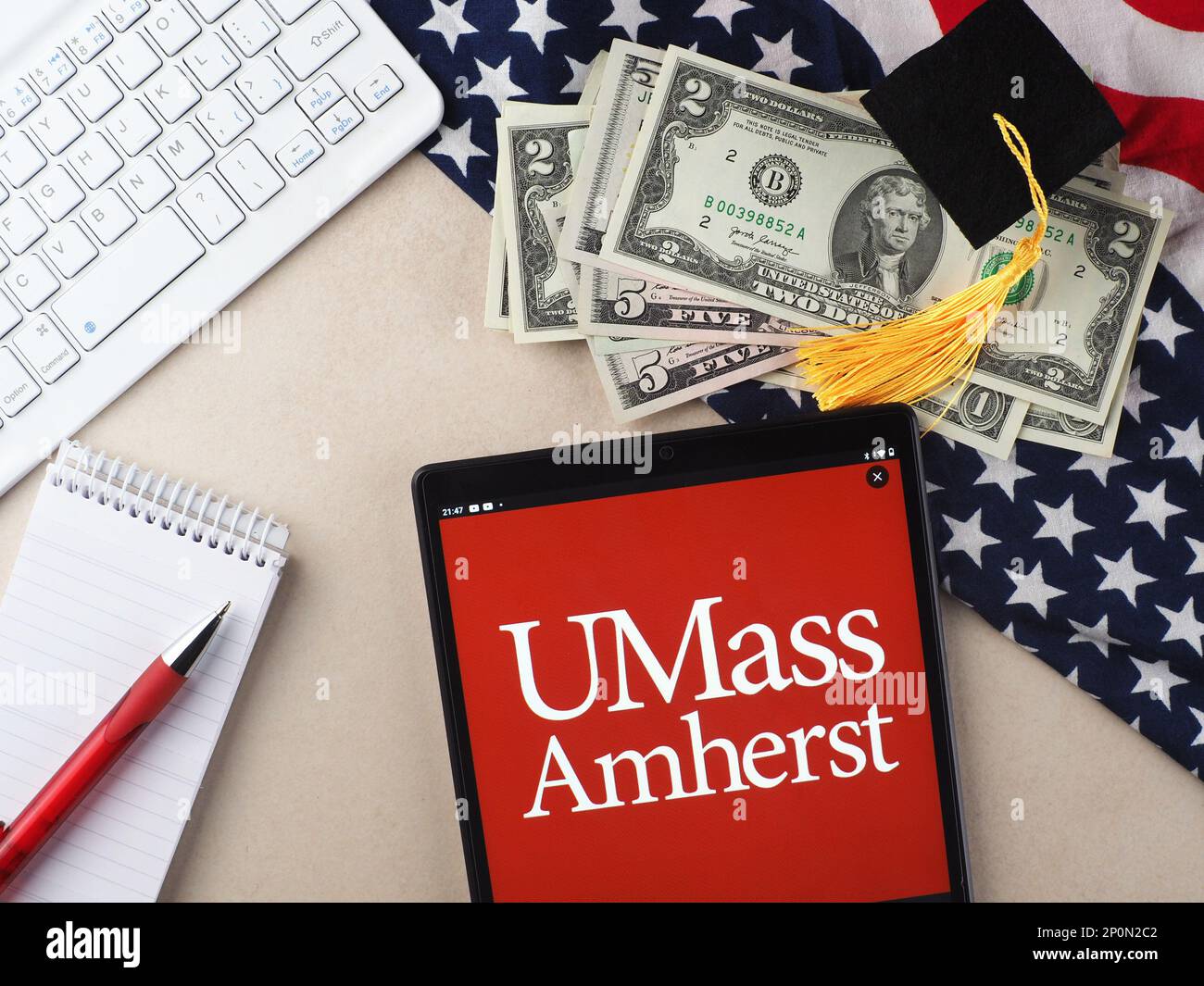In this photo illustration, University of Massachusetts, Amherst logo ...
