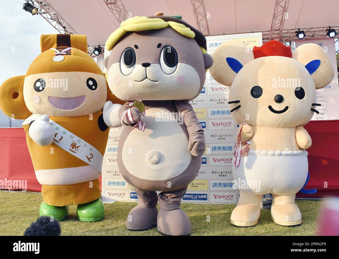 Shinjo-Kun (C) stands in between Hanipon (L) and Chuppy in Matsuyama ...