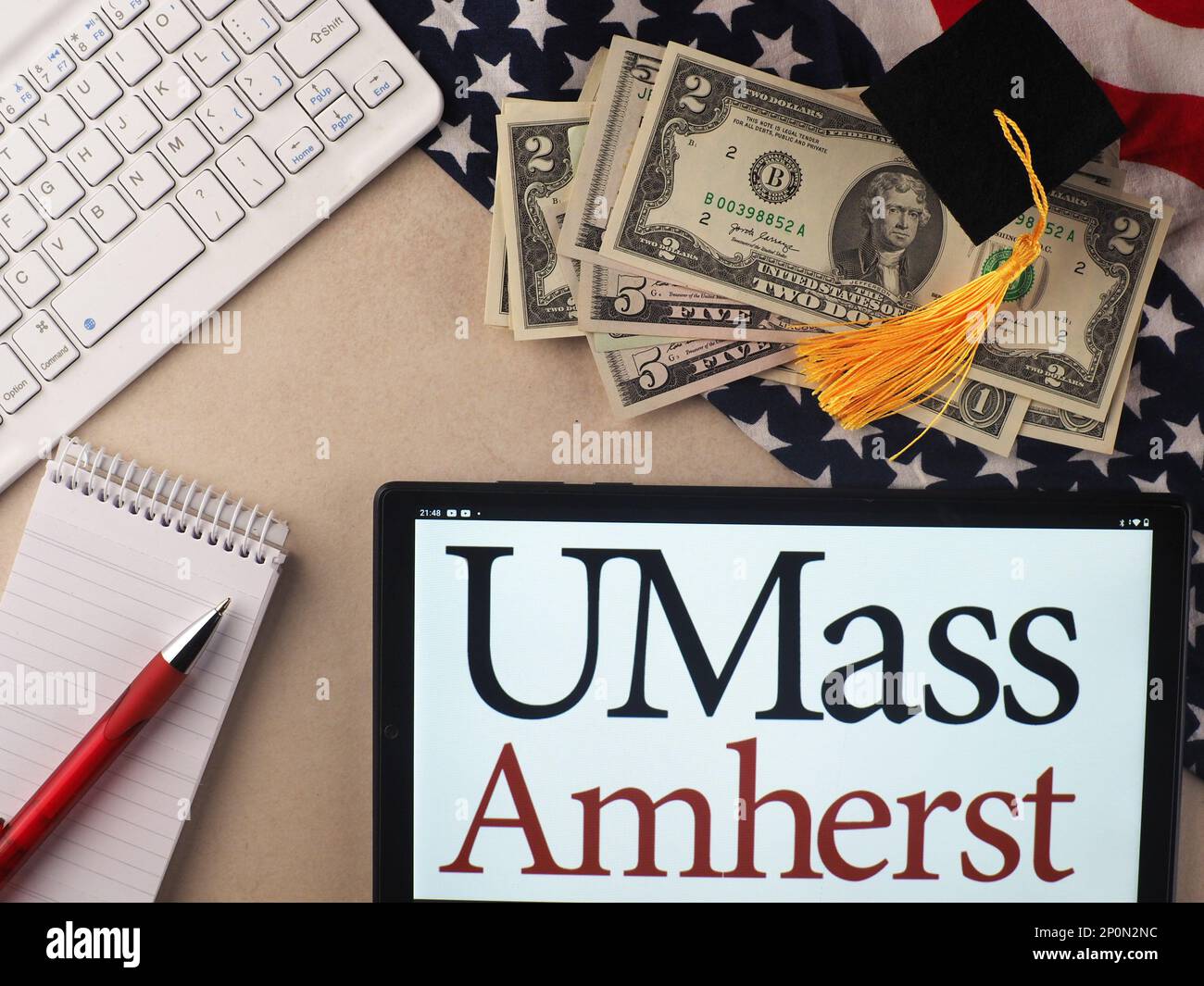 In this photo illustration, University of Massachusetts, Amherst logo ...