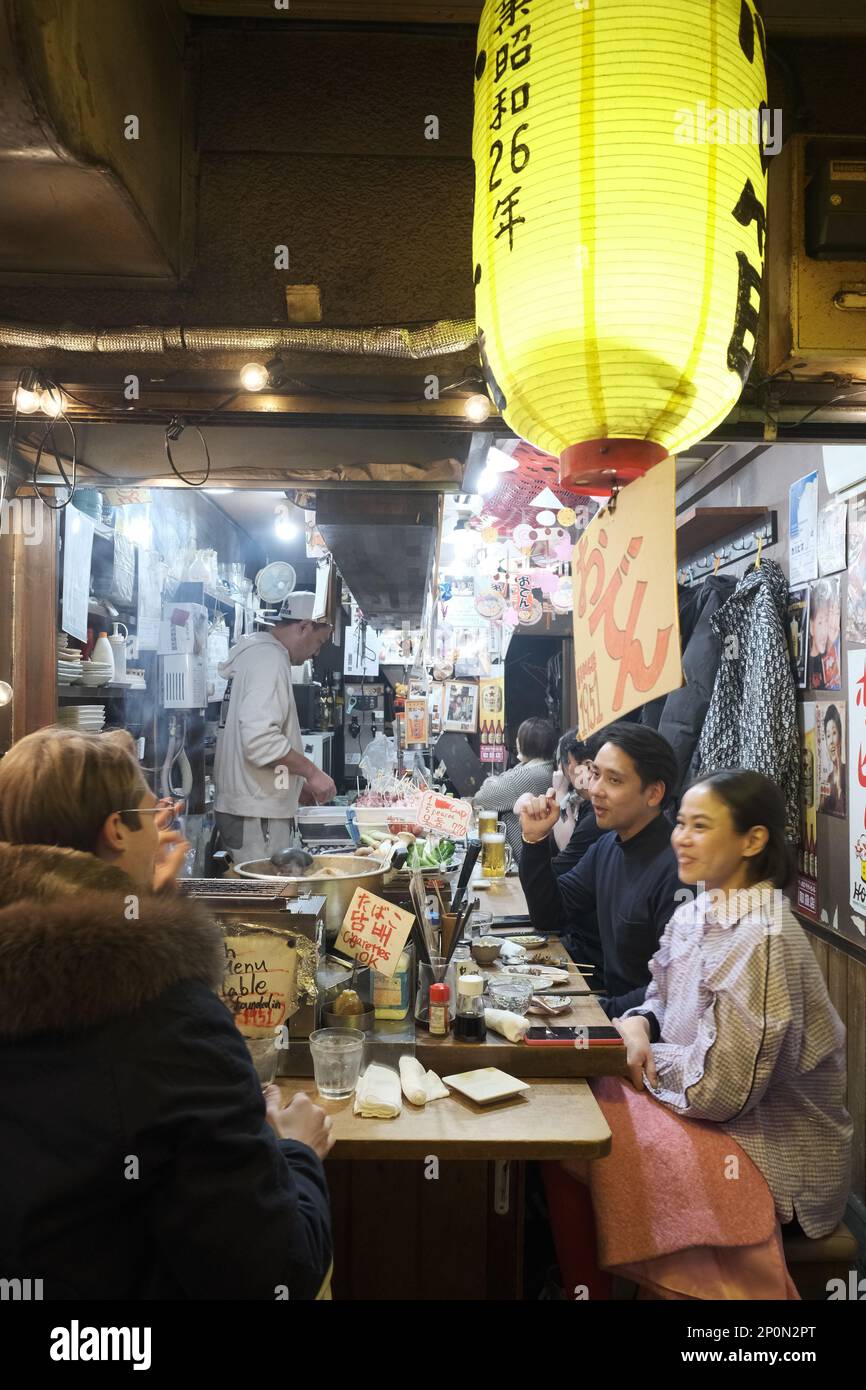 Small alleyway in Japan full of restaurants and people Stock Photo - Alamy