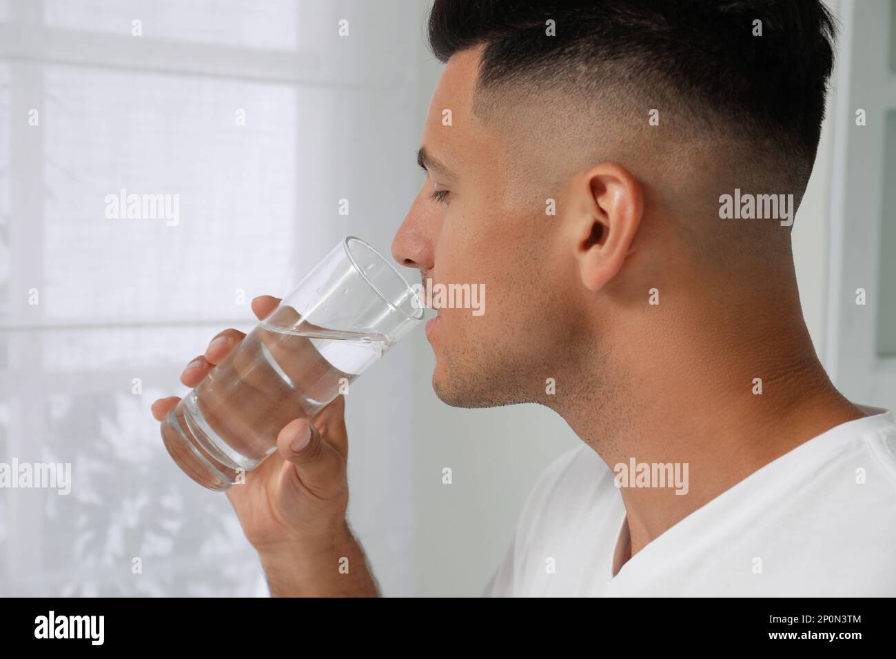 Man drinking tap water hi-res stock photography and images - Alamy