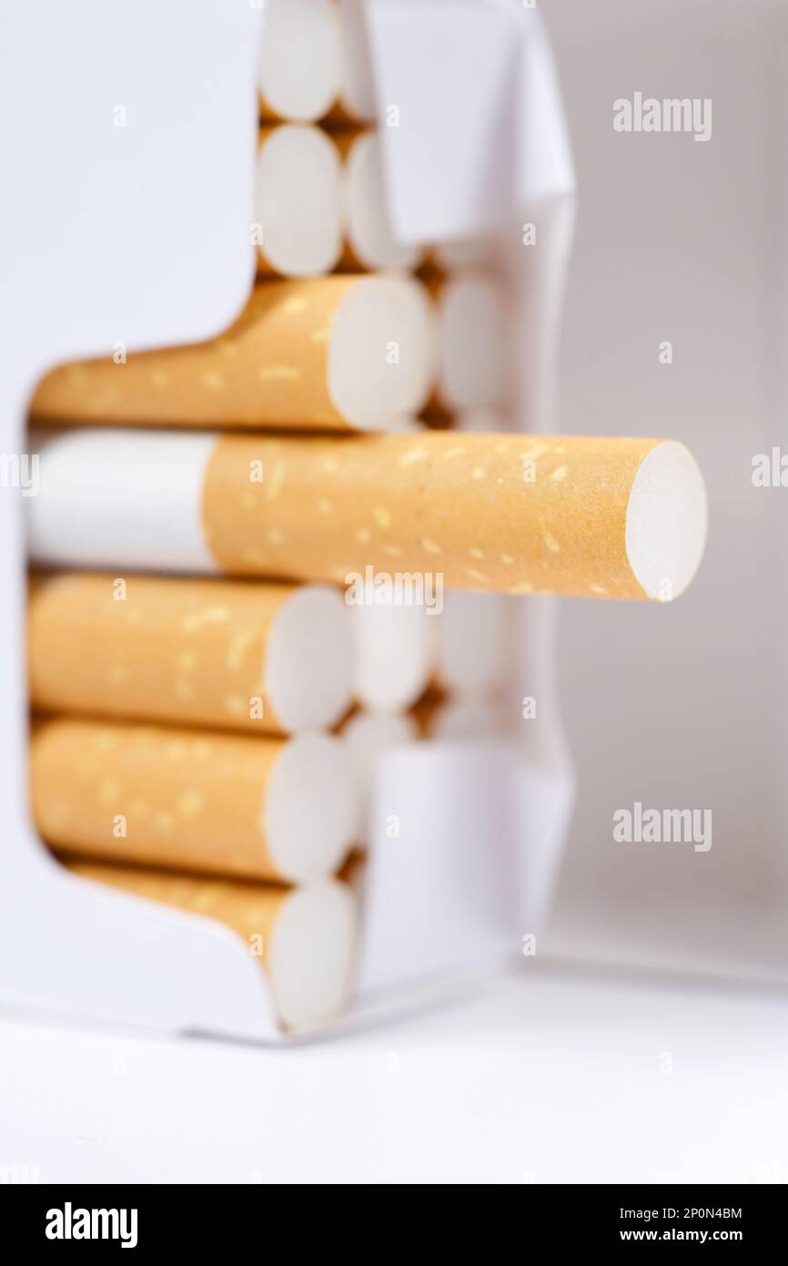 Close-up of cigarettes in a full pack Stock Photo - Alamy