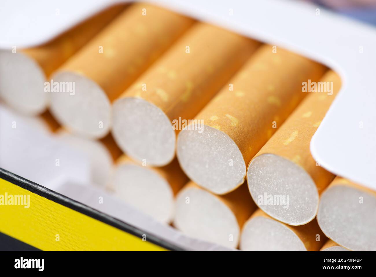 Close-up of cigarettes in a full pack Stock Photo - Alamy