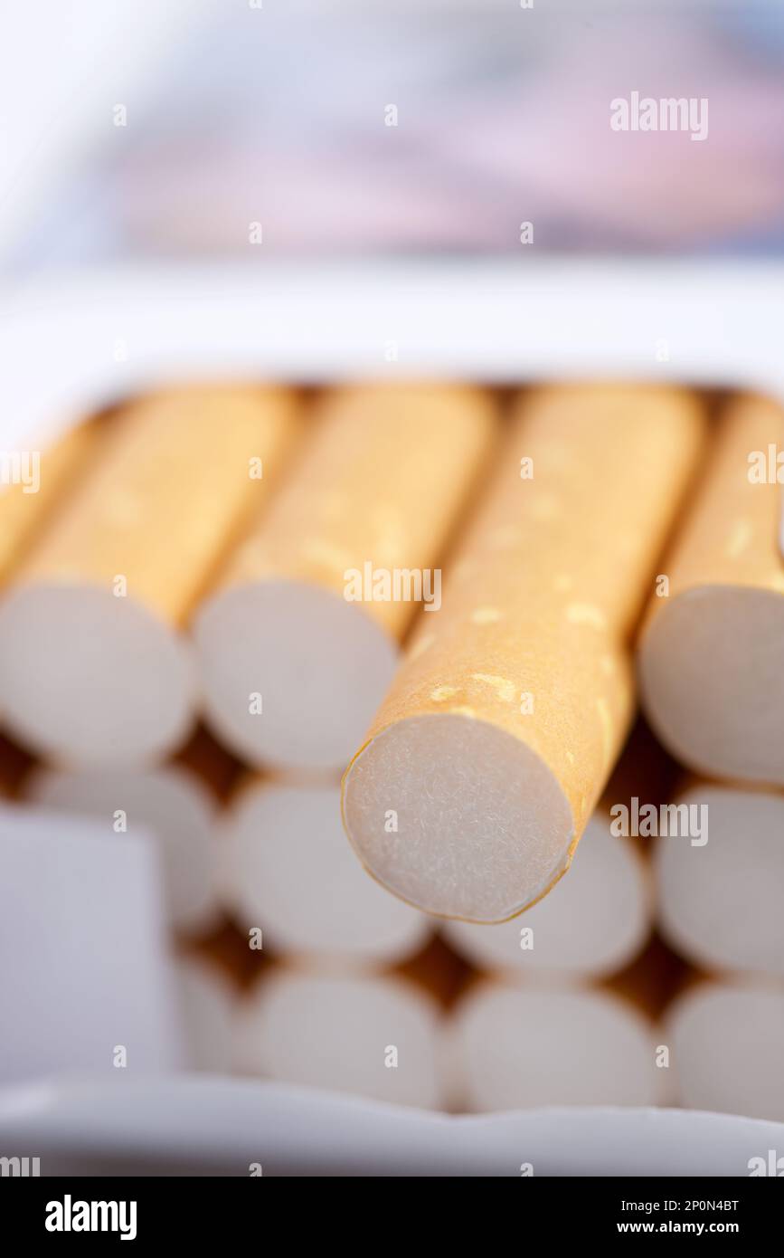 Close-up of cigarettes in a full pack Stock Photo - Alamy