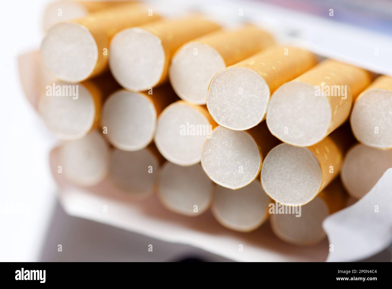 Close-up of cigarettes in a full pack Stock Photo - Alamy