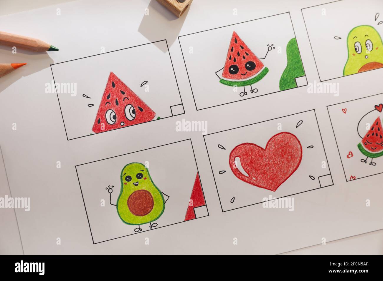 Storyboard with cartoon sketches at workplace, flat lay. Pre-production ...