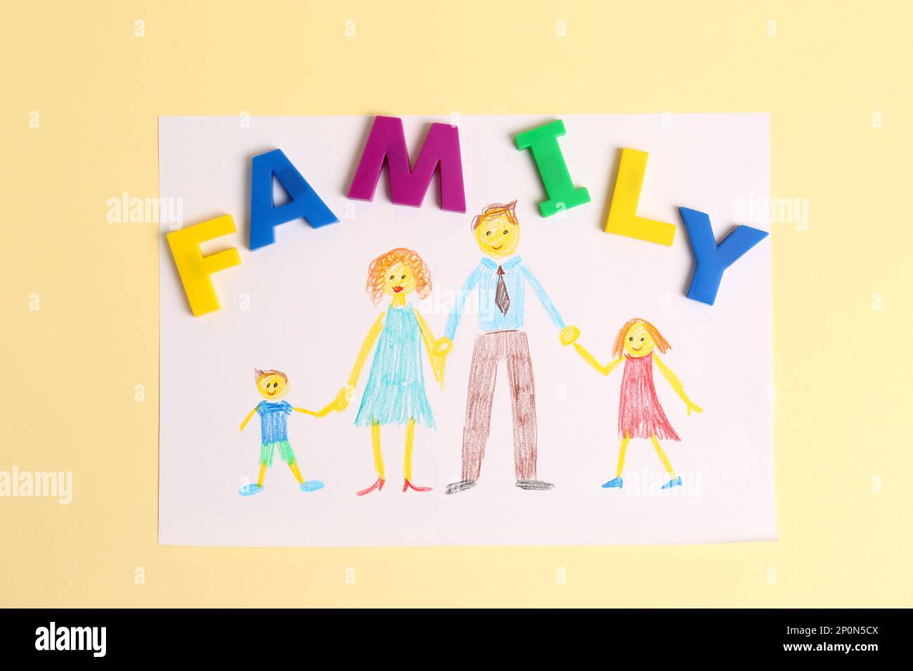 Word Family made of colorful letters and picture on pale yellow ...