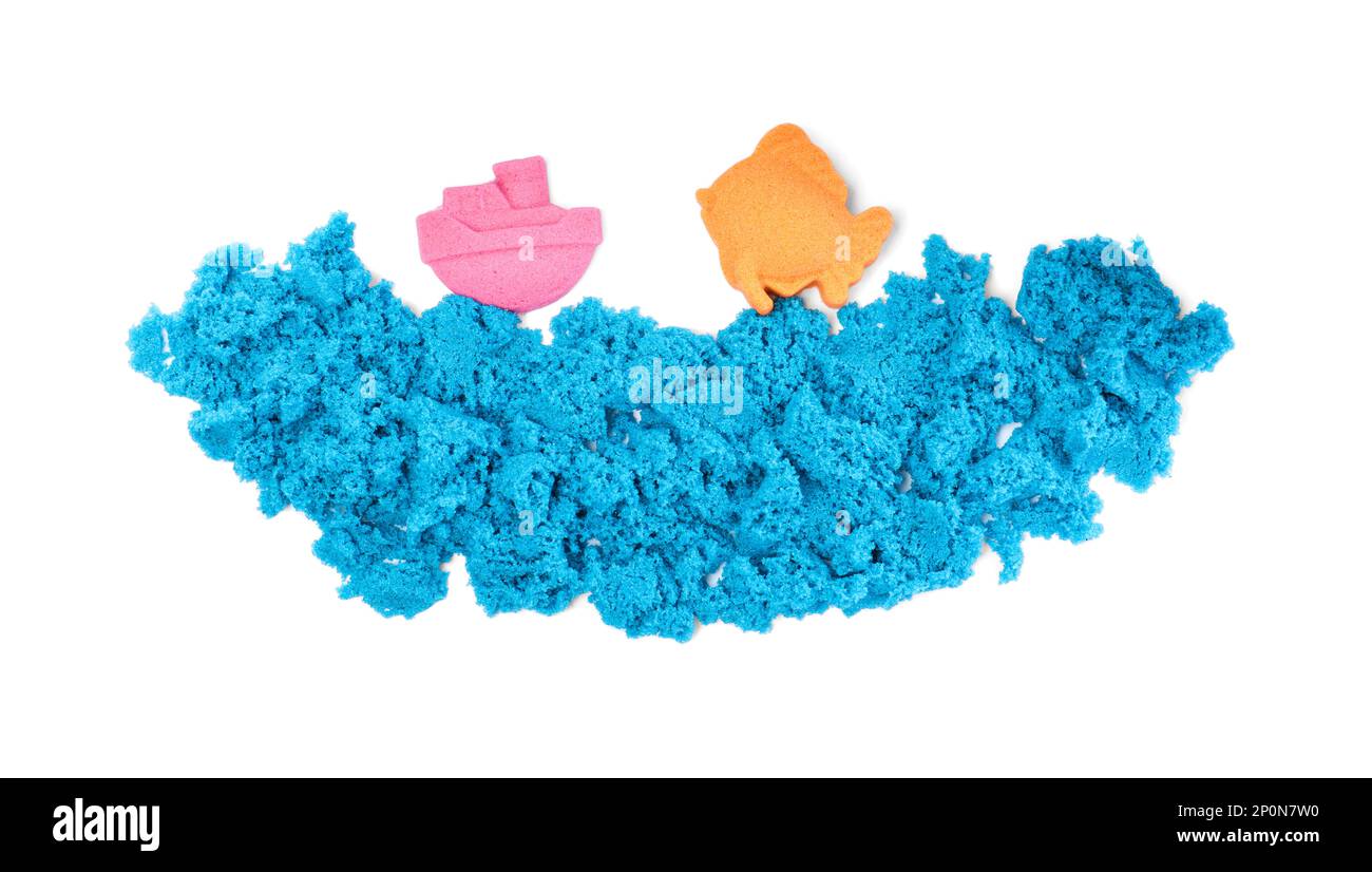 Ship, fish and sea made of kinetic sand on white background, top view ...