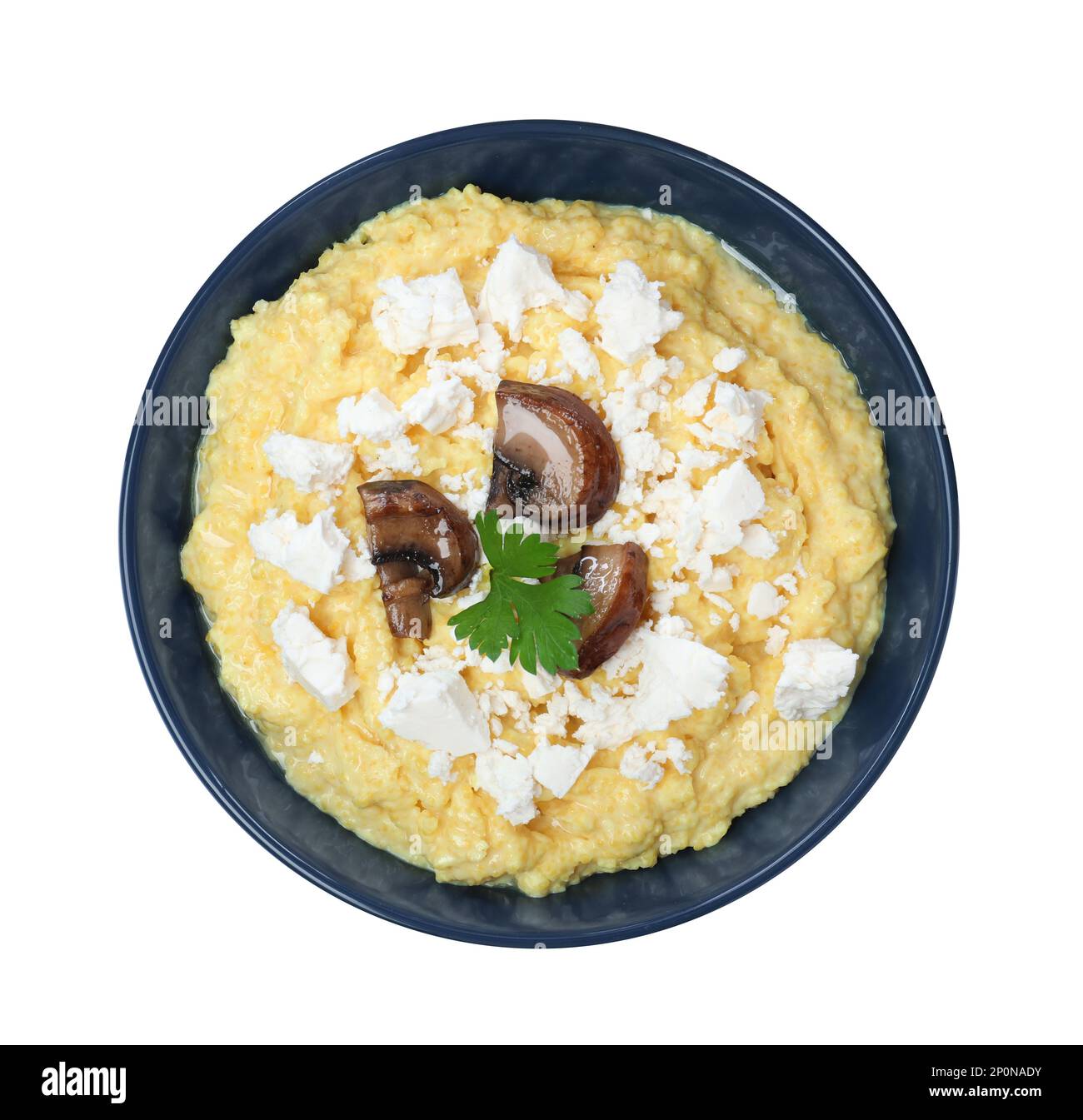 Tasty banosh with brynza and mushrooms in bowl isolated on white, top ...