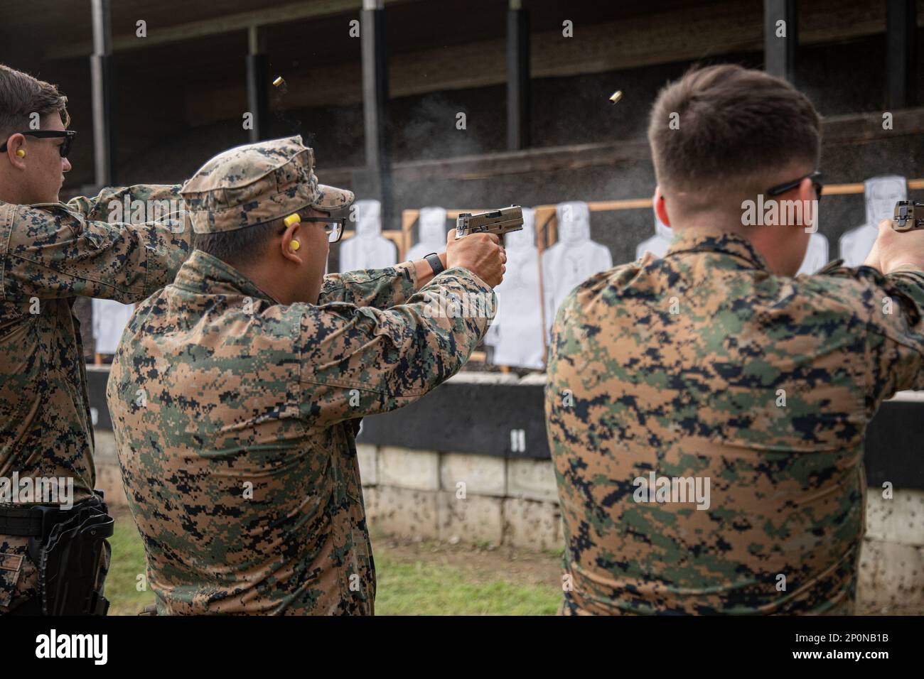 U.S. Marines practice pistol drills during the Marine Corps ...