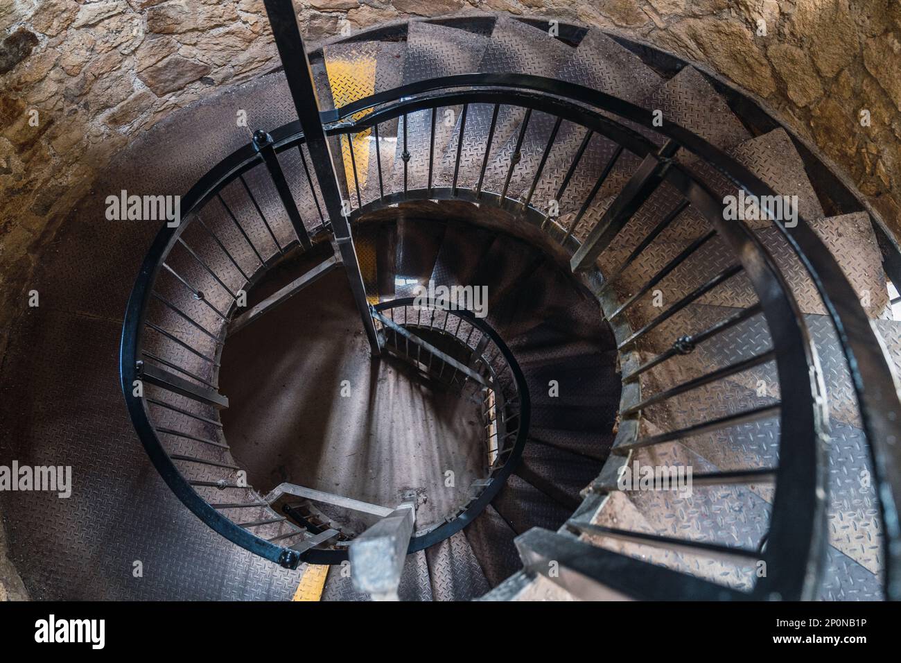 Ascending to the Watchtower: A Steel Spiral Staircase Inside a Castle's ...