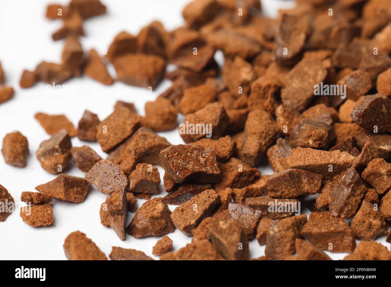 Pile of chicory granules on white background, closeup Stock Photo - Alamy