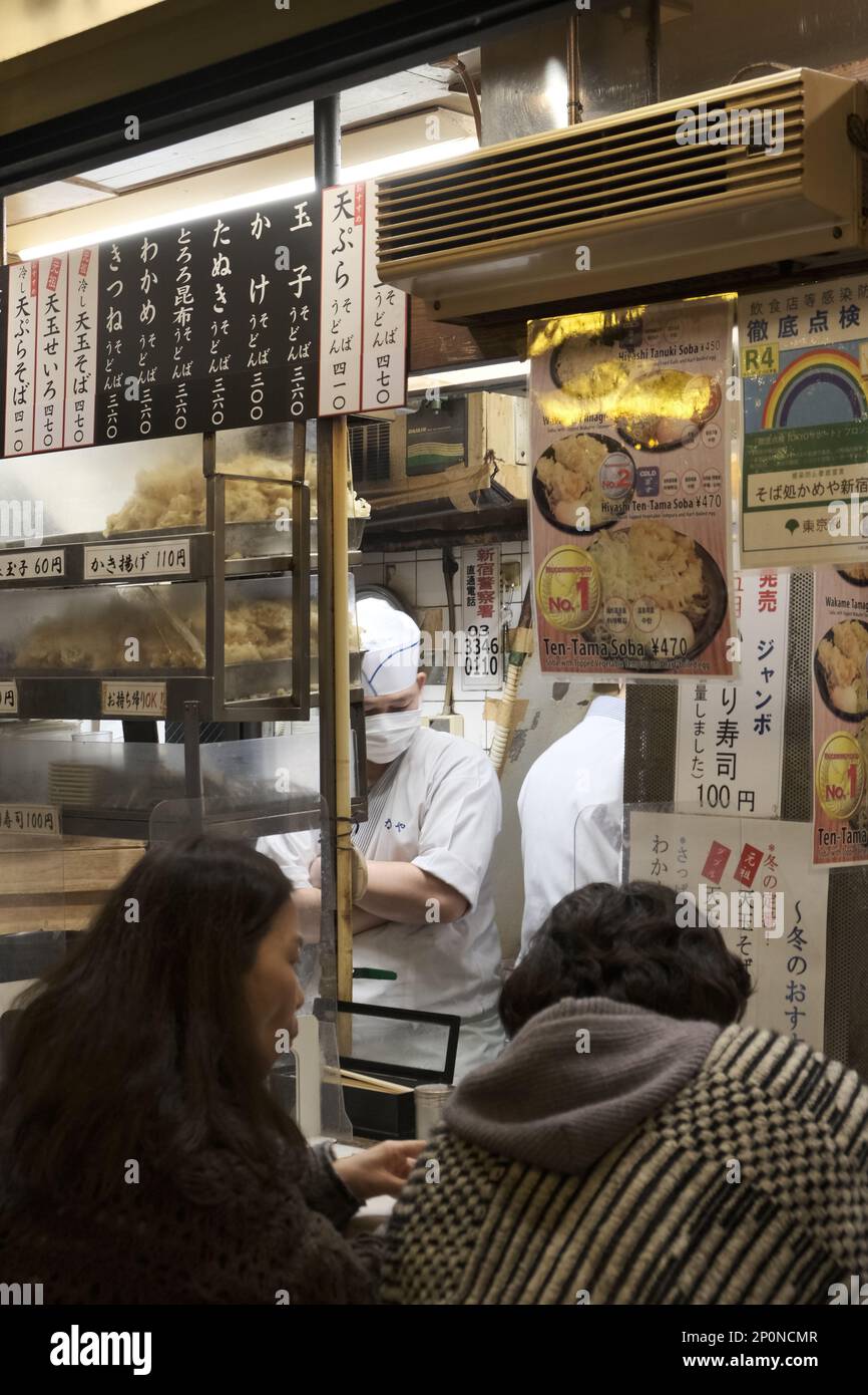Small alleyway in Japan full of restaurants and people Stock Photo - Alamy