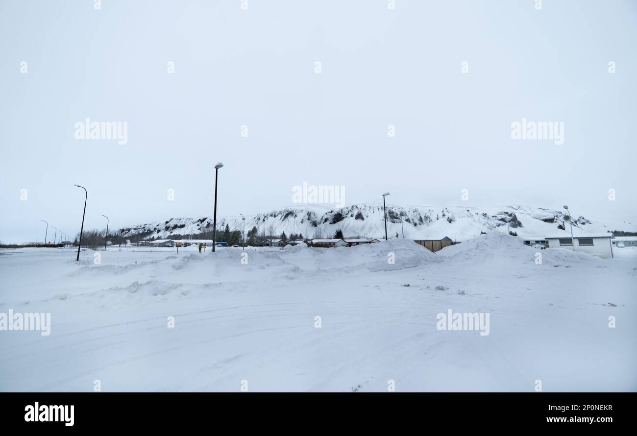 Rural landscape completely covered in snow at a roundabout in Vik i ...