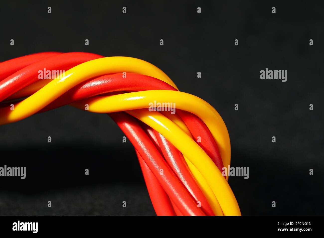 Electrical wires on black background, closeup. Space for text Stock ...