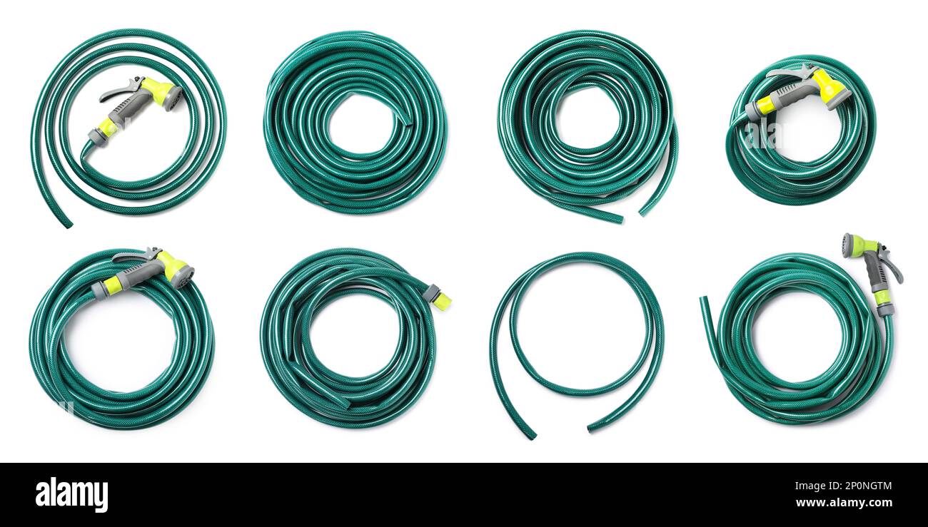 Set with green rubber watering hoses on white background, top view ...