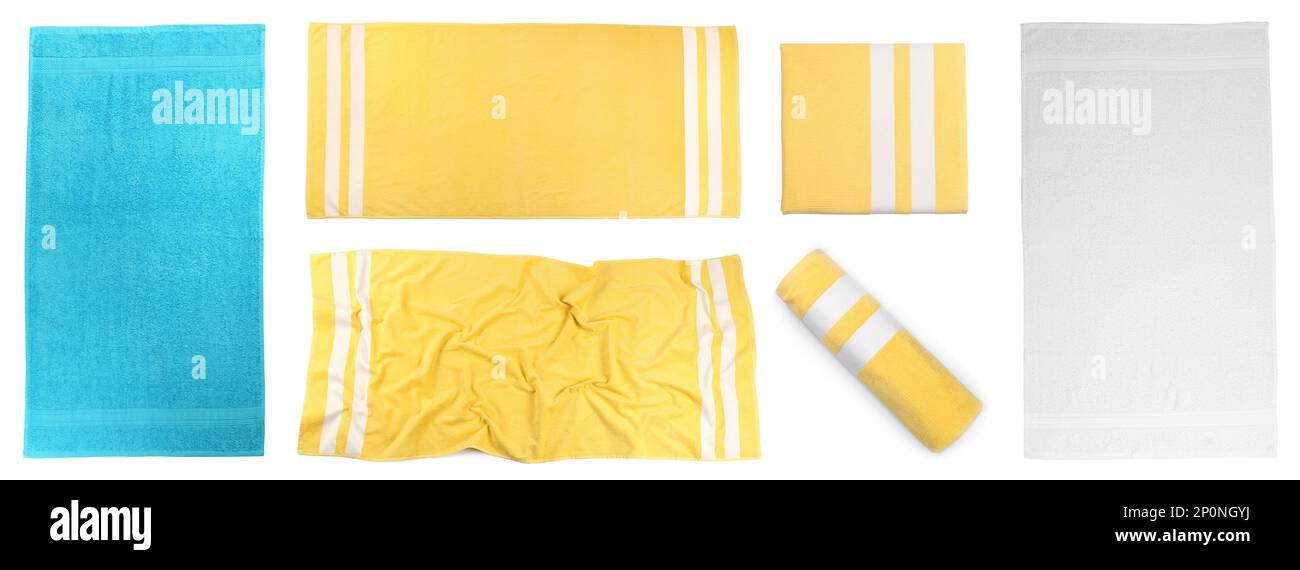 Set with different beach towels on white background, top view. Banner ...