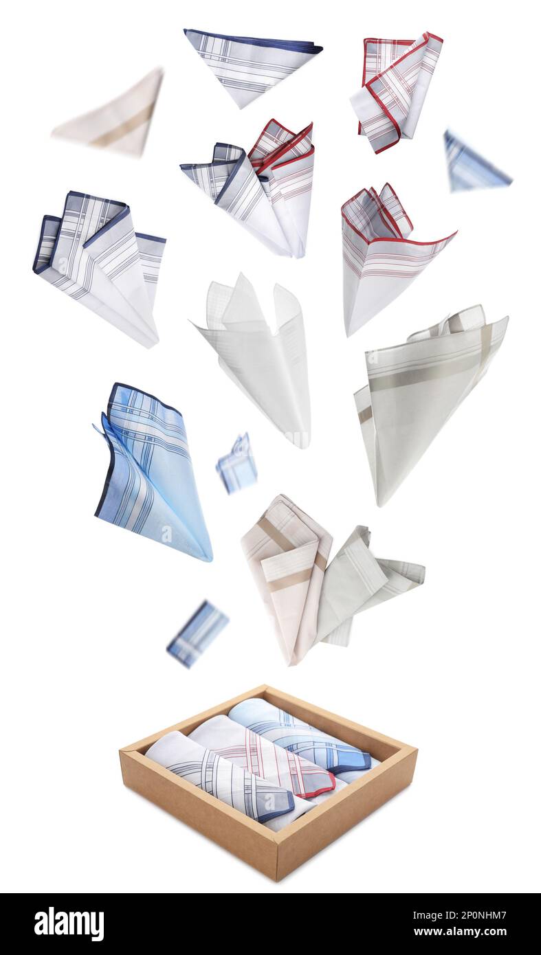 Many different handkerchiefs falling into box on white background Stock ...