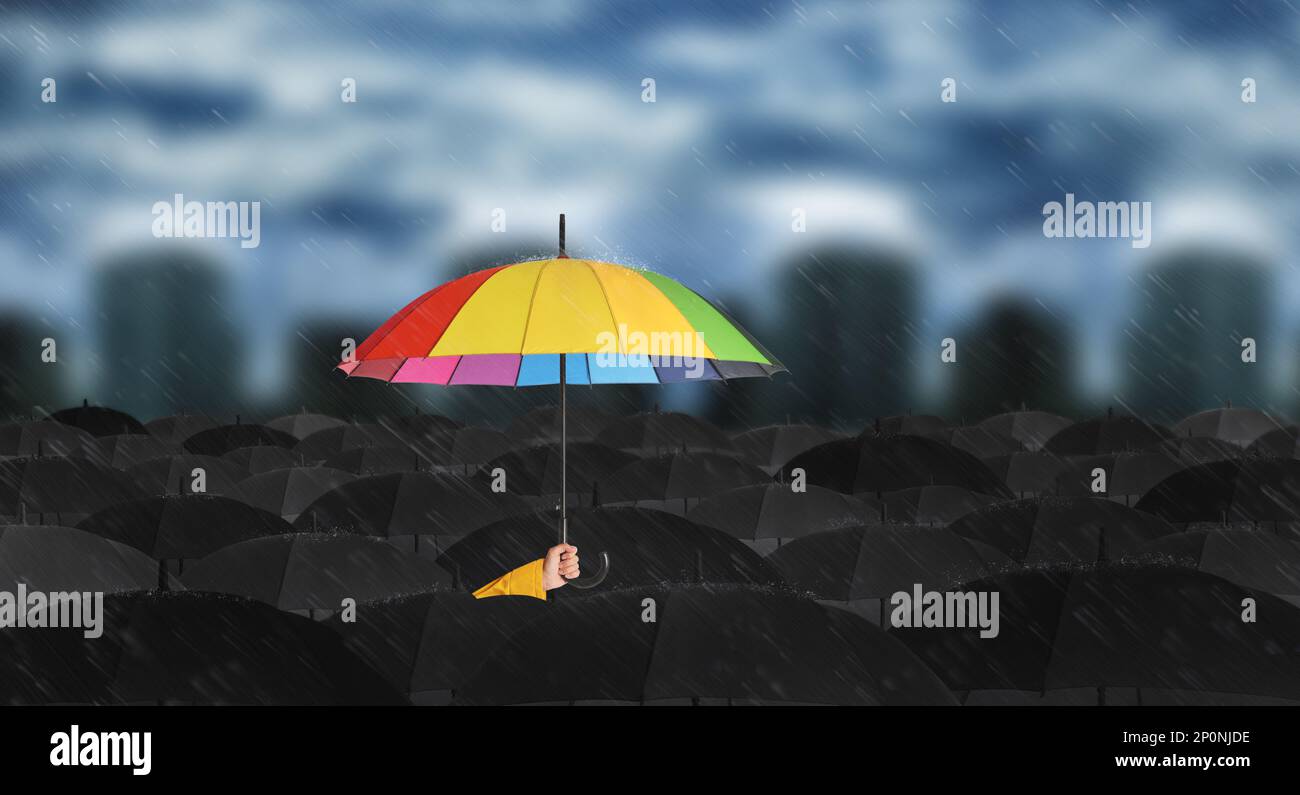 Person holding umbrella over other under heavy rain outdoors Stock ...