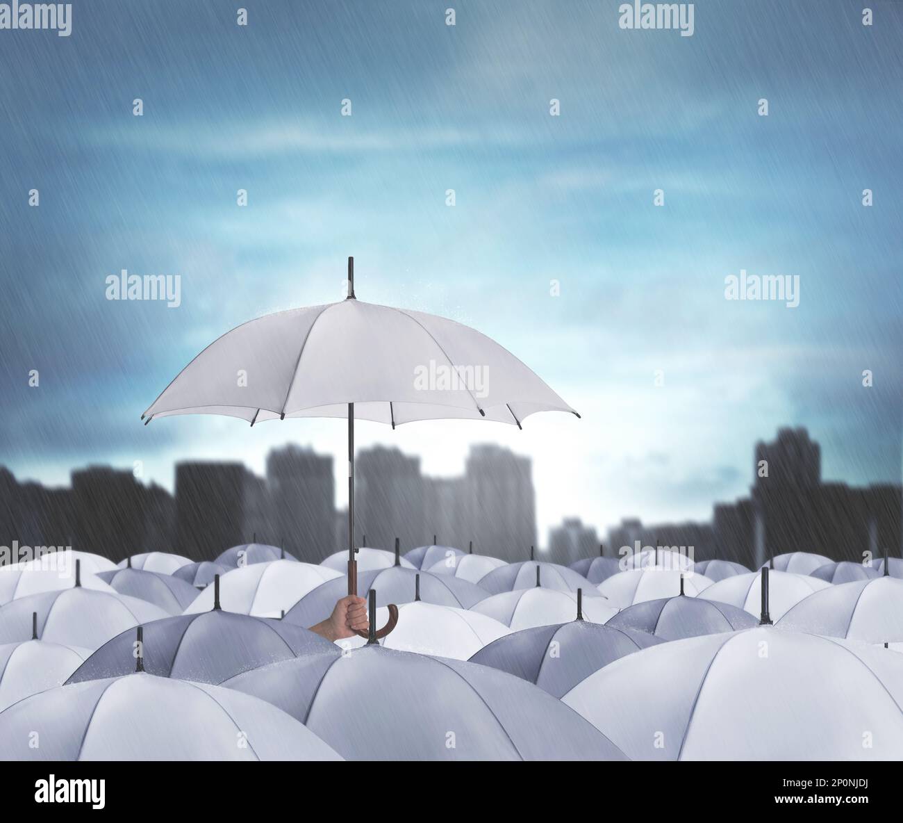 Person holding umbrella over other under heavy rain outdoors Stock ...