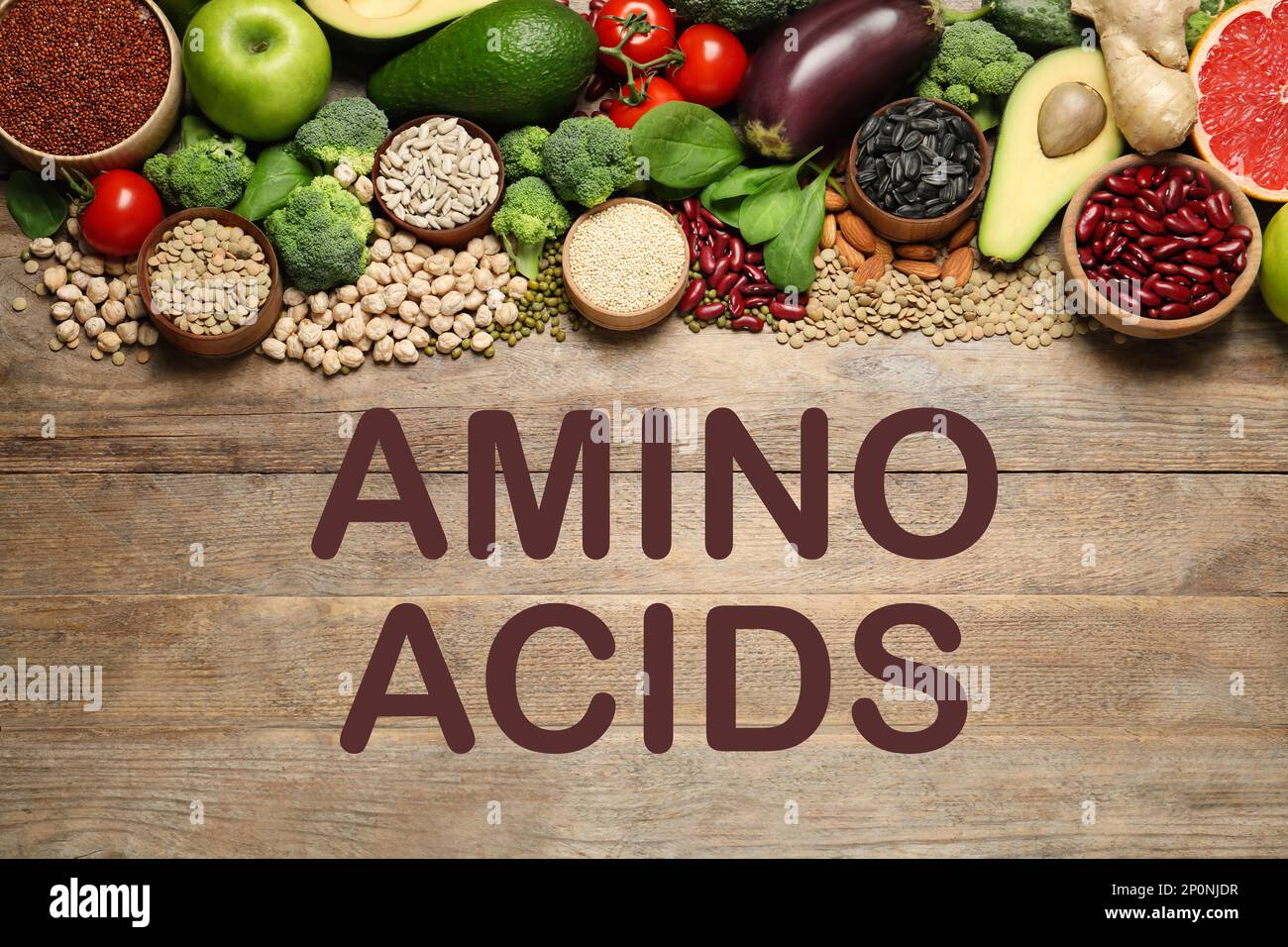 Different vegetables, seeds and fruits on wooden table, flat lay ...