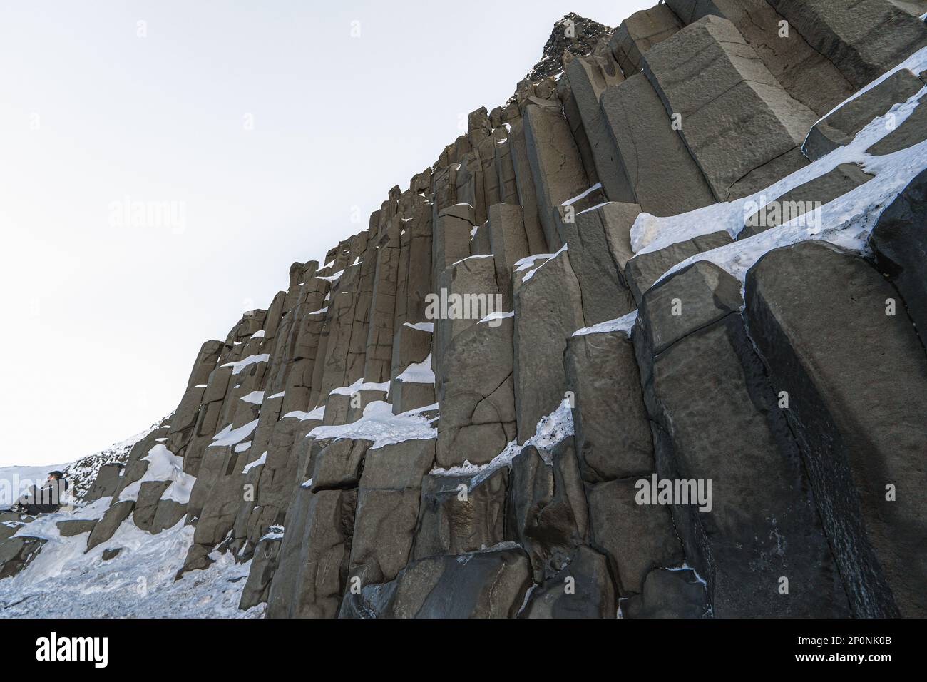Basaltic or Hálsanef snow columns from below Reynisfjara Black Beach or ...