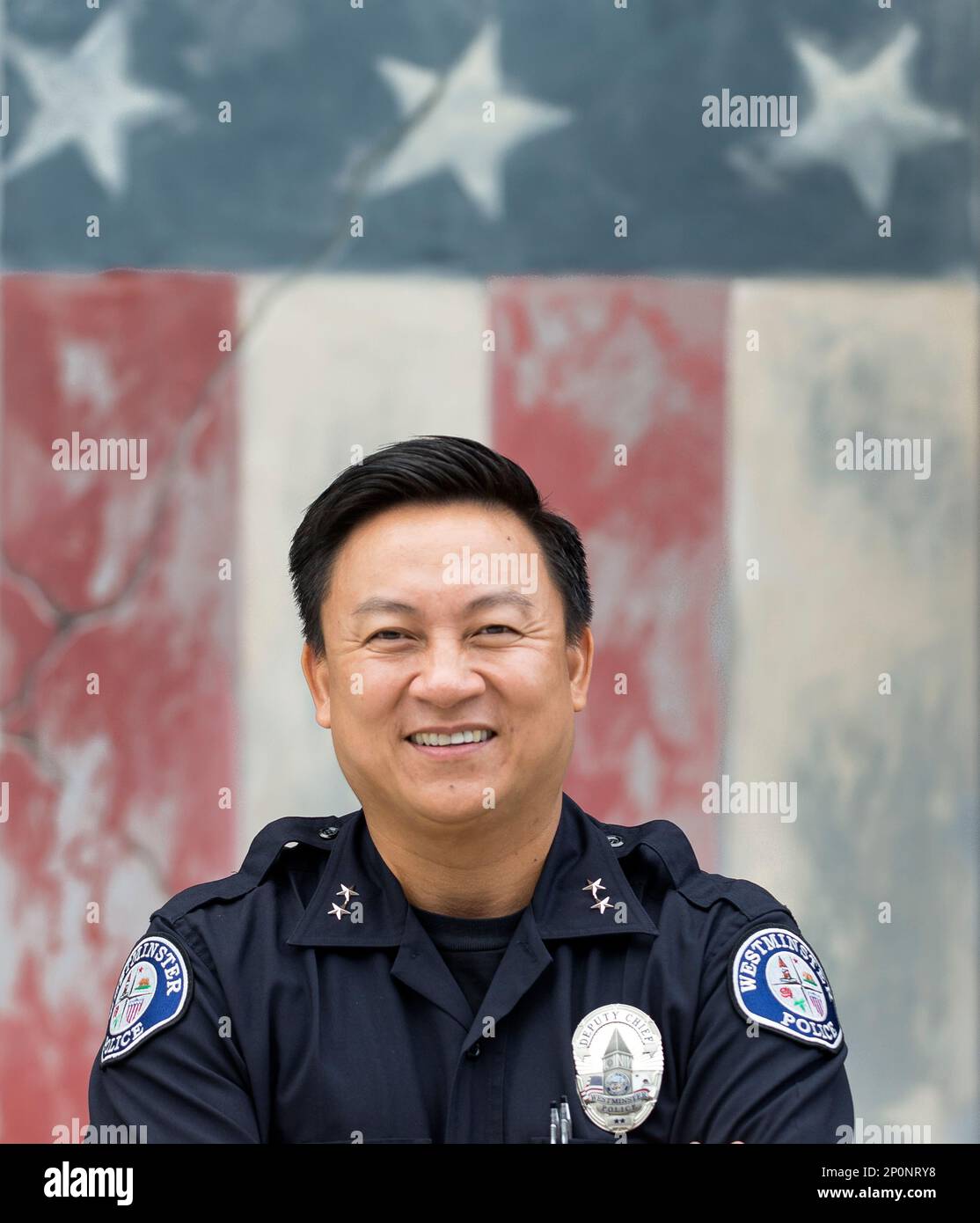 New Deputy Chief Tim Vu poses for a photo at the Westminster Police Department station in ...