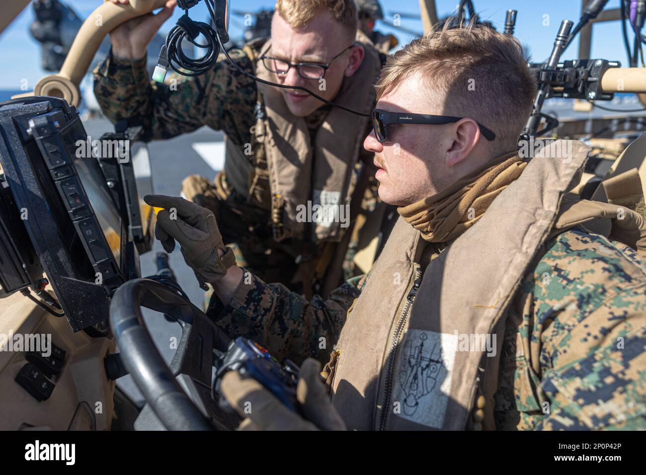 U.S. Marines with the 26th Marine Expeditionary Unit (MEU), track a ...