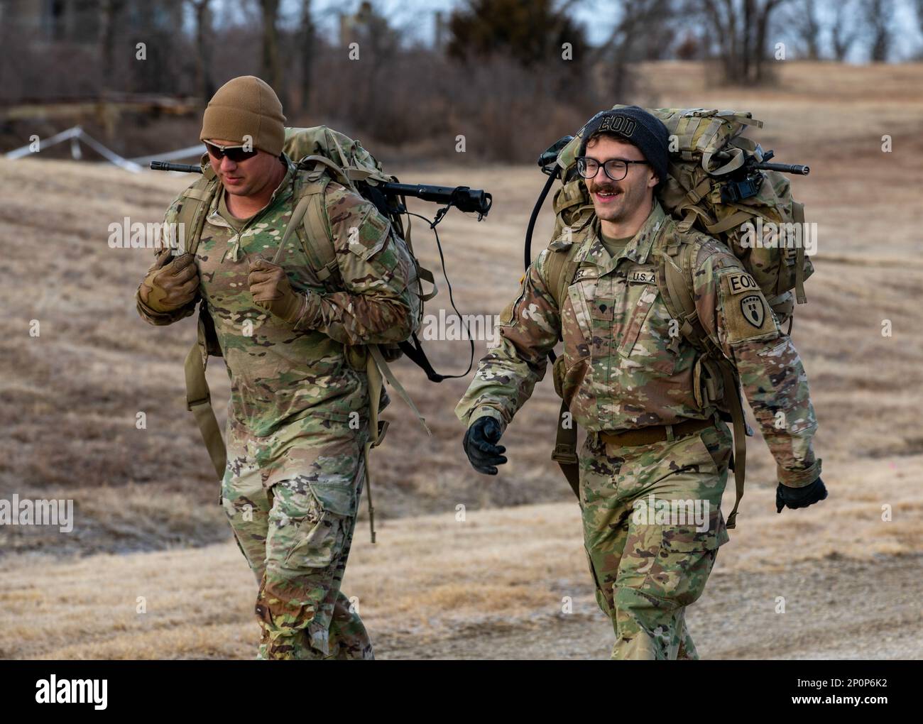 U.S. Army Staff Sgt. Jacob T. Kunst (left) and U.S. Army Spc. Dean D ...