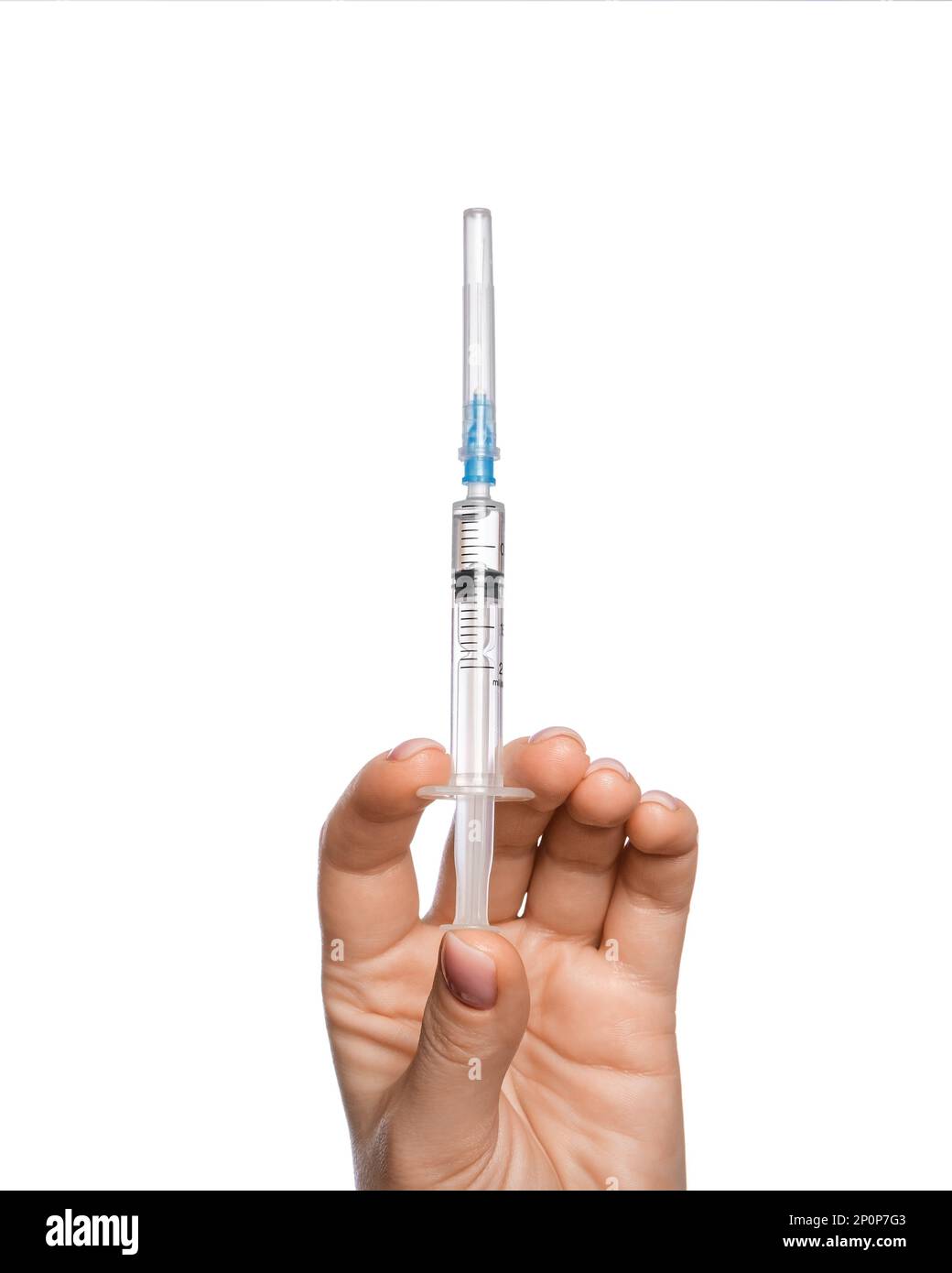 Medical syringe in hand with liquid for injection on white background ...