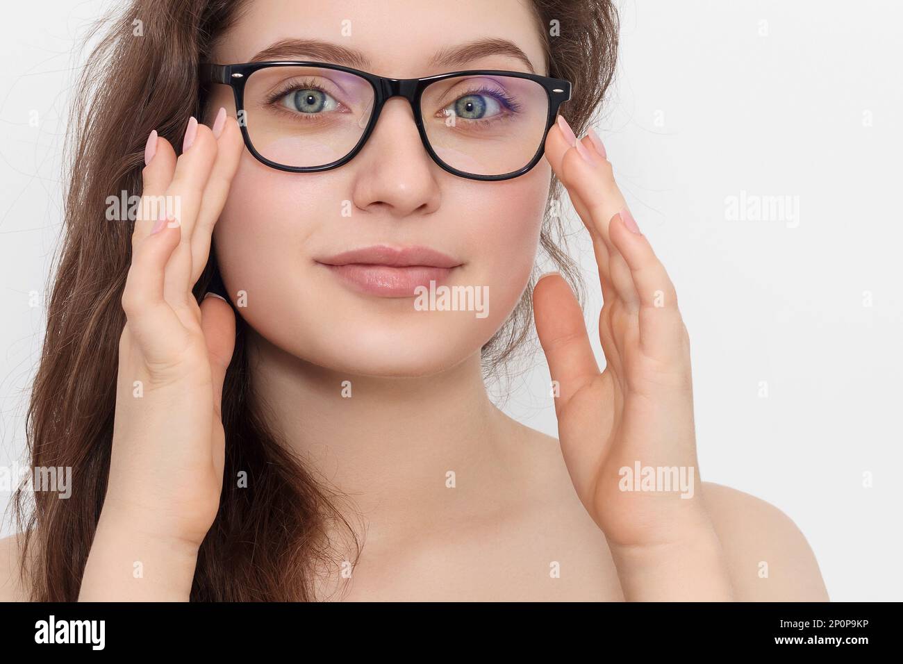 Teenager in glasses, beauty photo on a white background. Girl with big ...