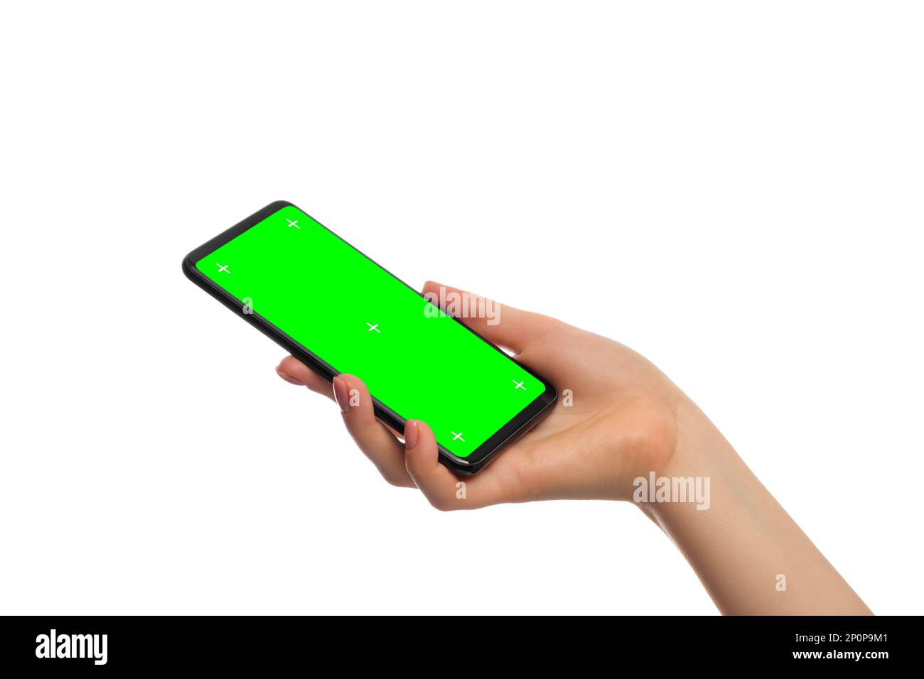 Smartphone with green screen in a woman's hand, isolated, copy space ...