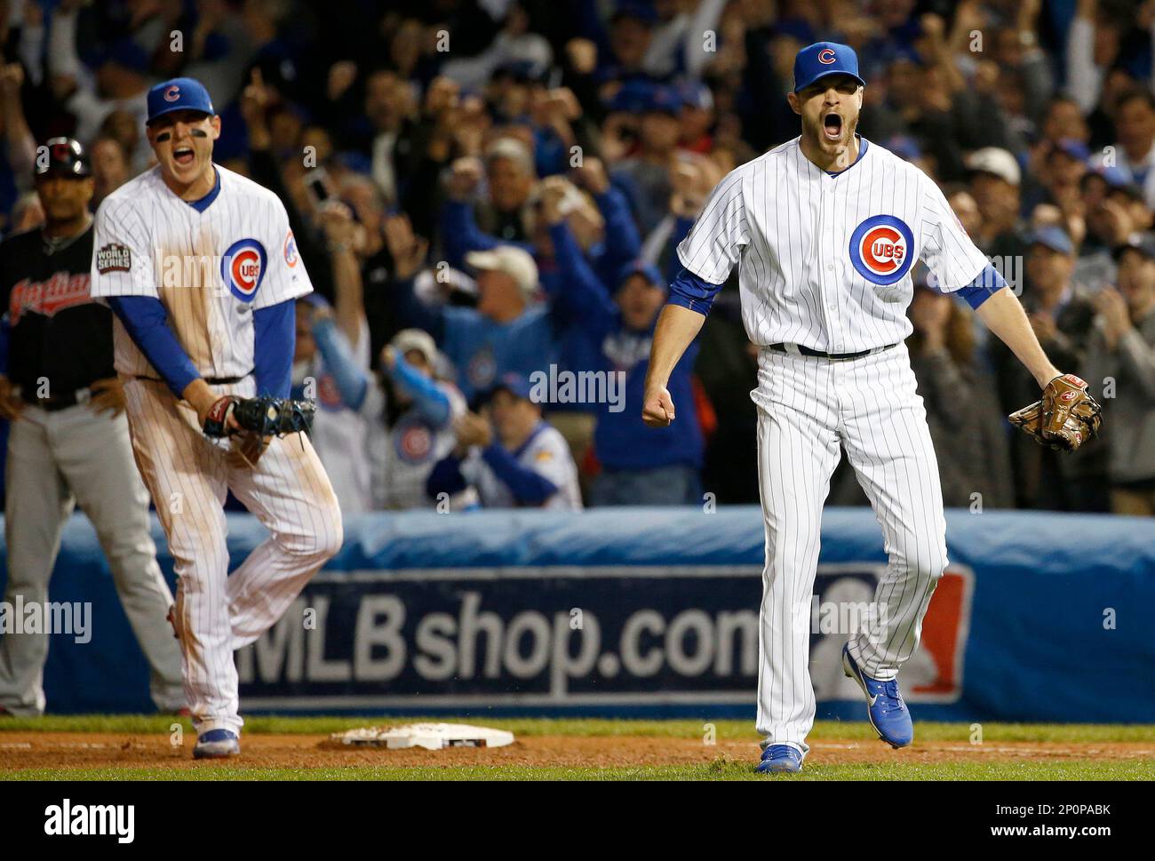Chicago Cubs first baseman Anthony Rizzo, left, and relief pitcher ...