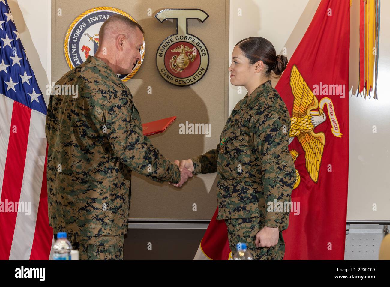 U.S. Marine Corps Maj. Gen. David W. Maxwell, left, the commanding ...