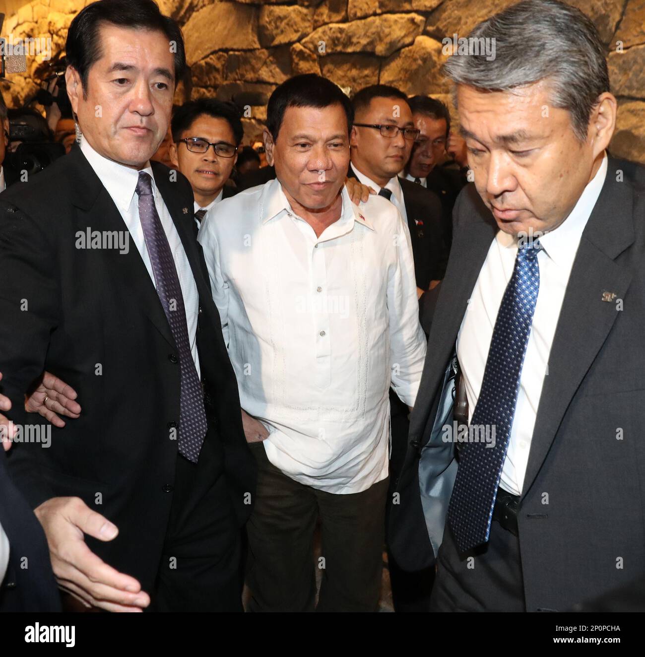 Philippine President Rodrigo Duterte (C) approaches the crowd of ...