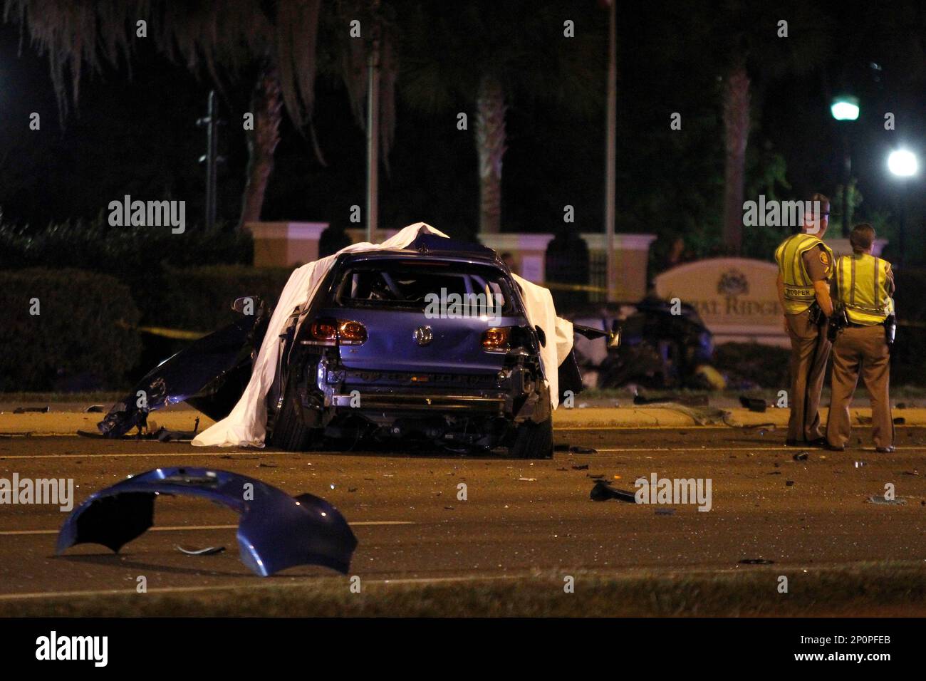 Law enforcement investigate a crash late Wednesday, Oct. 26, 2016 in ...