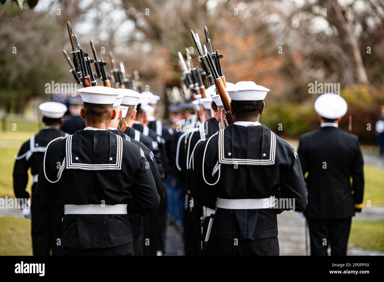 Service members from the U.S. Navy Honor Guard participate in an Armed ...