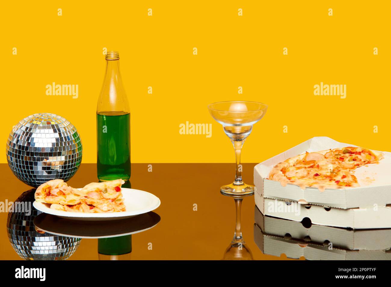 Delicious italian pizza with cocktail and disco ball against bright ...