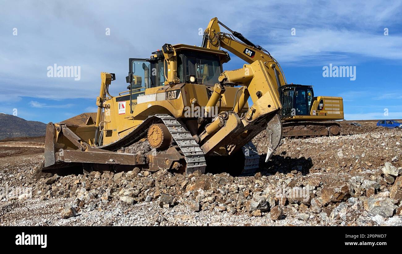 Excavator With Hydraulic Hammer And Bulldozer Working At Huge Mining ...