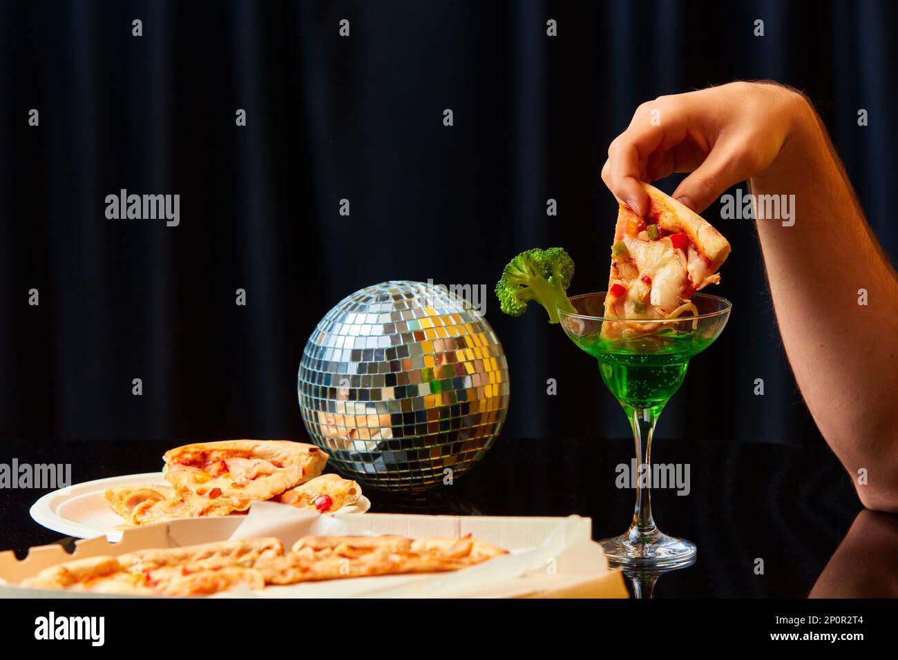 Party time. Food pop art photography. Close-up image of male hand ...