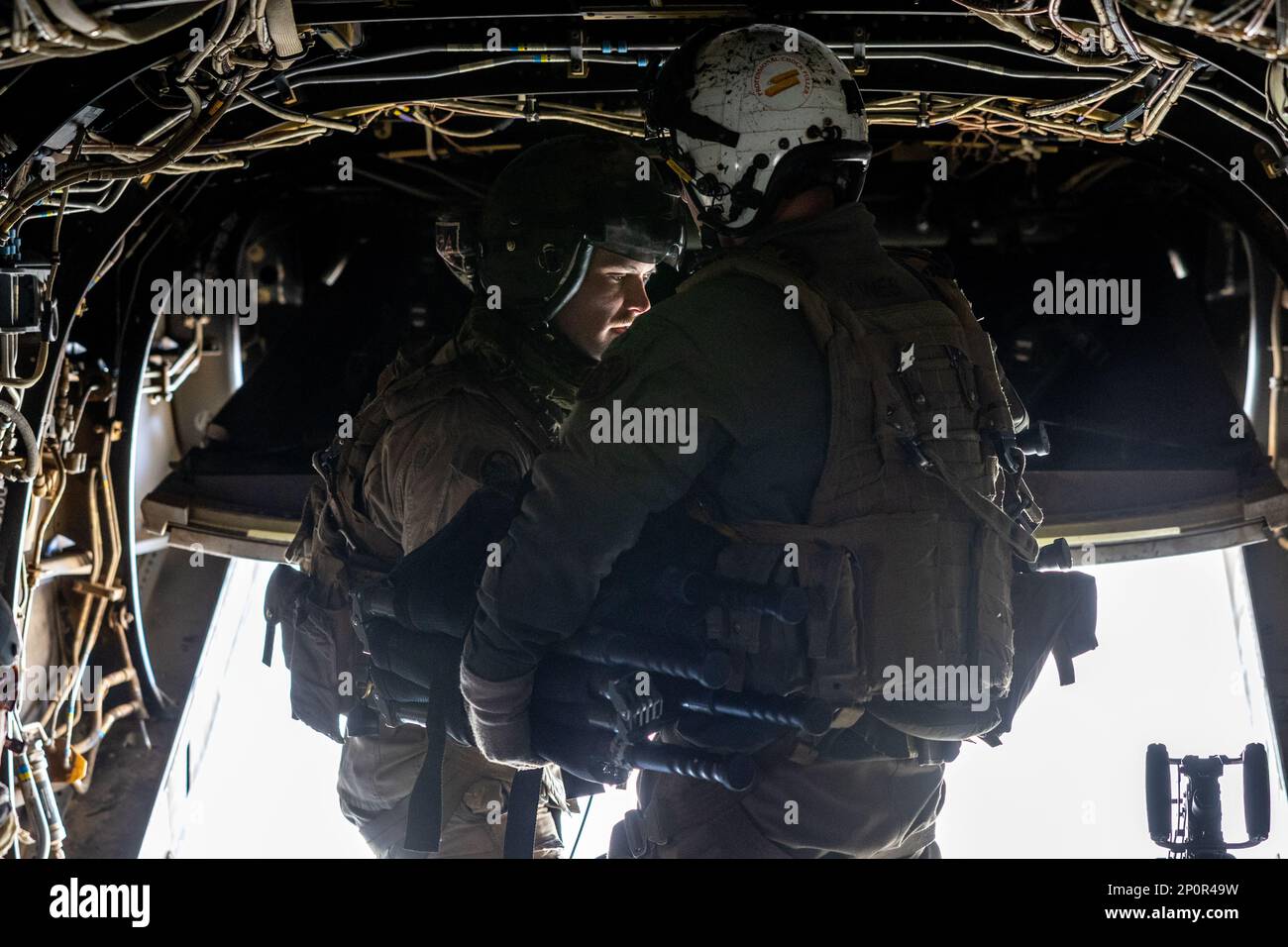 U.S. Marine Corps Sgt. Brady Wulf, left, and Cpl. Samuel Jones, crew ...