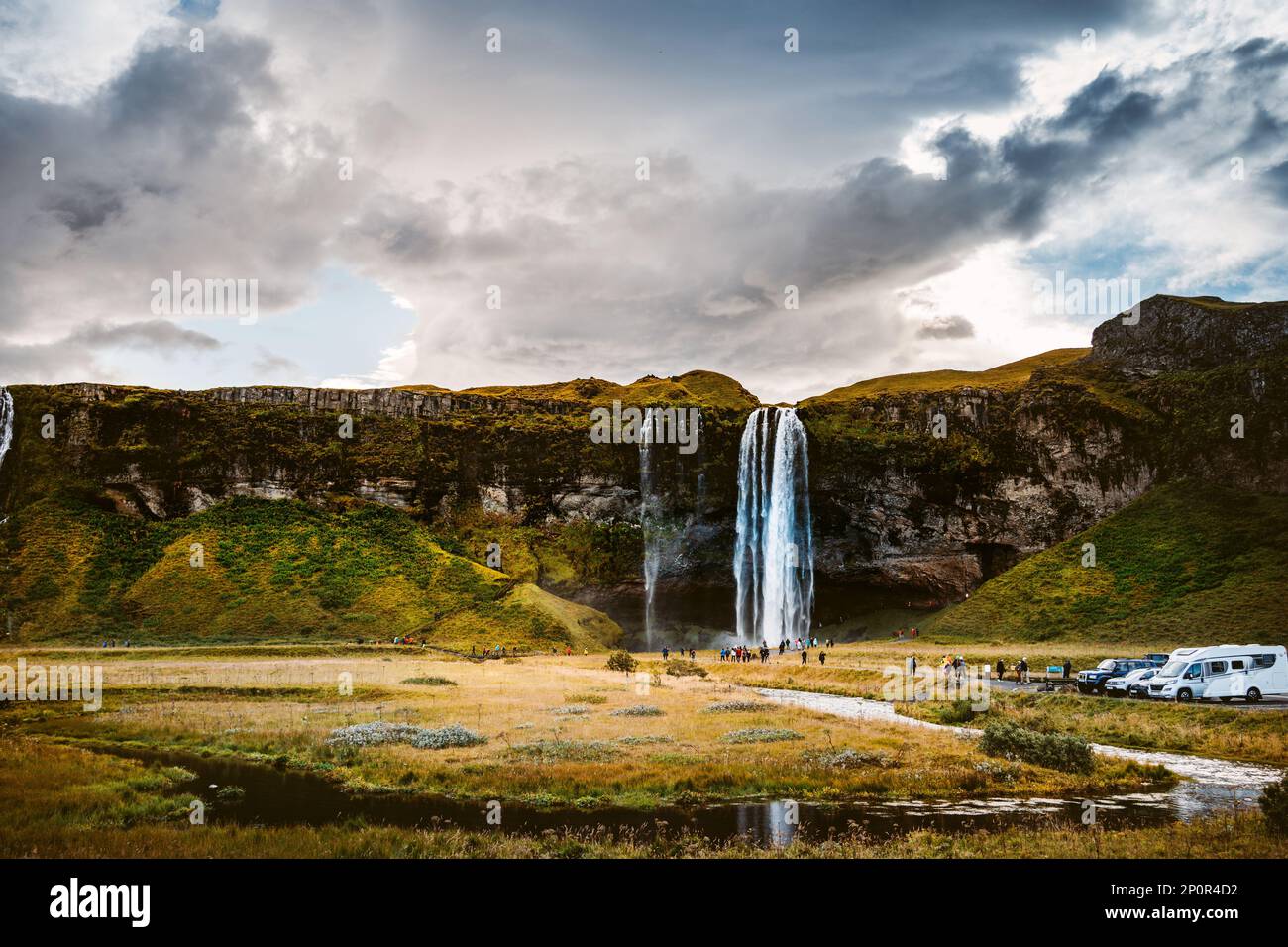 Iceland's Power and Beauty A Majestic Waterfall Plunging from a ...
