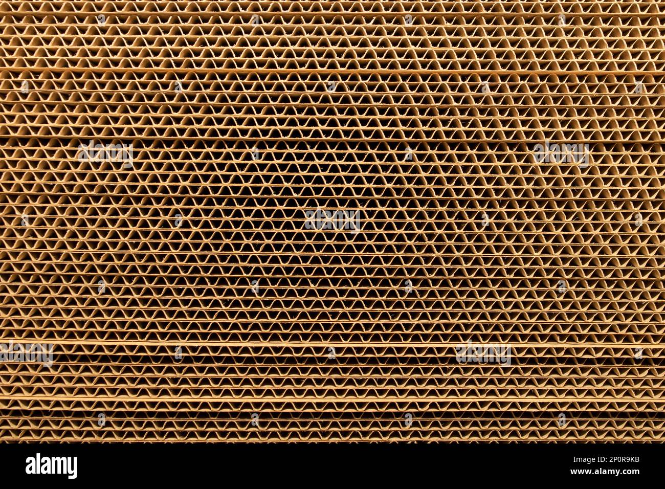 Stacked cardboard sheets, undulated paper, stripped background Stock ...